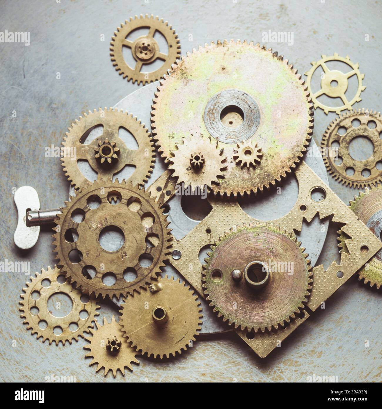 Steampunk background from mechanical clocks details over old metal ...