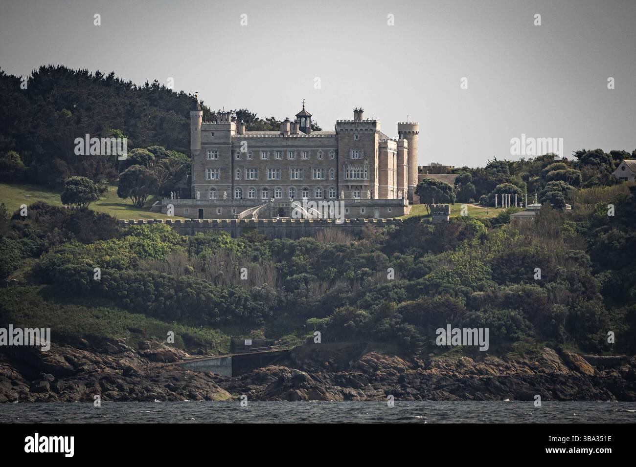 The mock-Gothic castle with 100-foot granite walls, battlements, and a ...