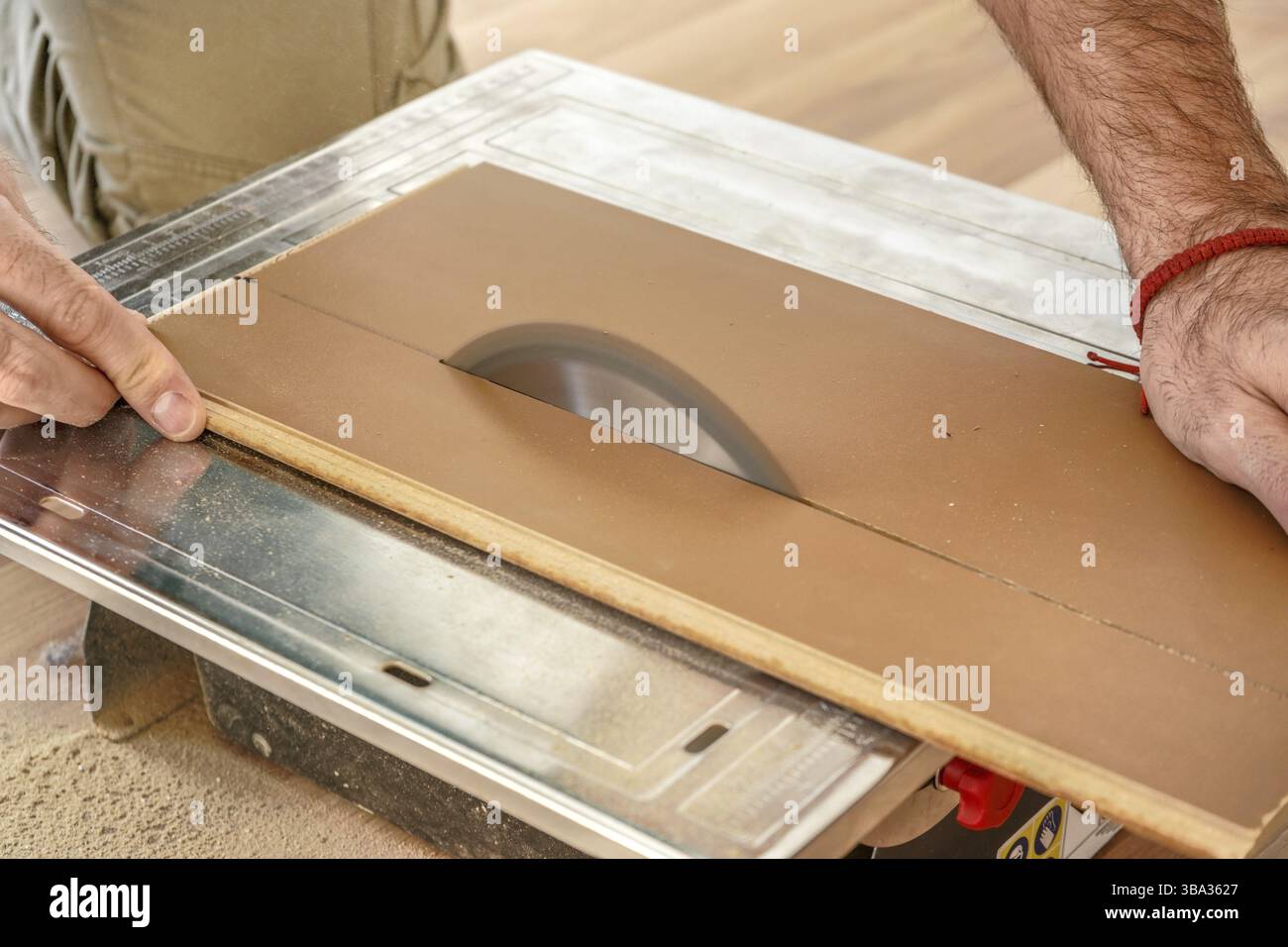 Male carpenter lay wooden laminate hi-res stock photography and images ...
