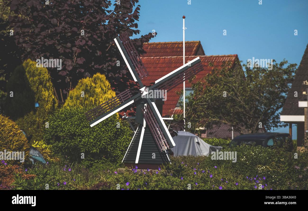 Small dutch wooden mill in the garden in The Netherlands Stock Photo ...