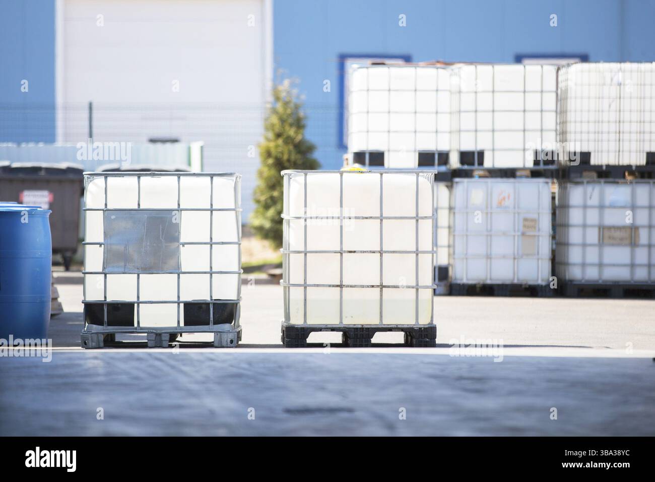 Large plastic containers in the factory Stock Photo - Alamy