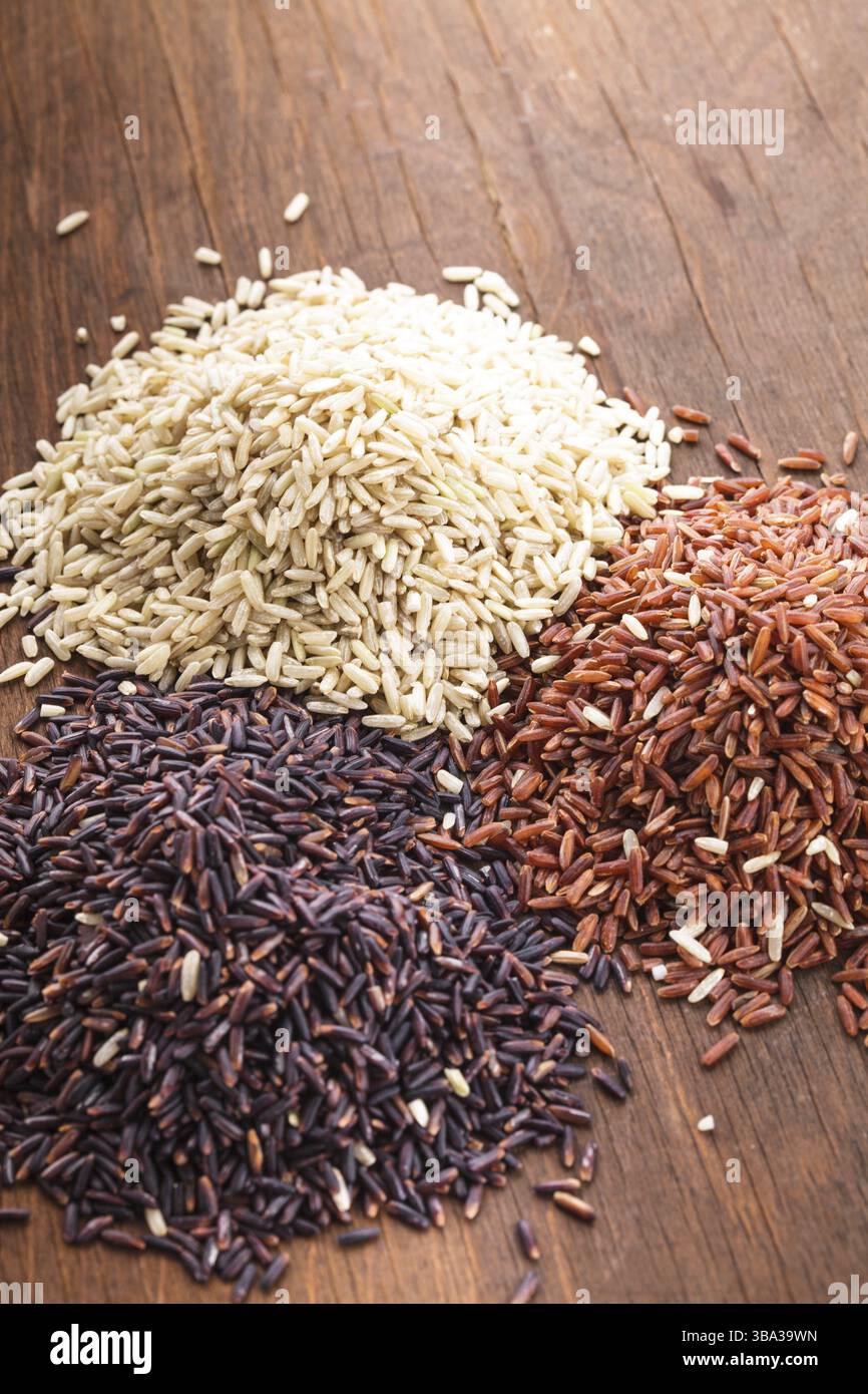 Healthy rice variety: brown, red and wild black Stock Photo - Alamy