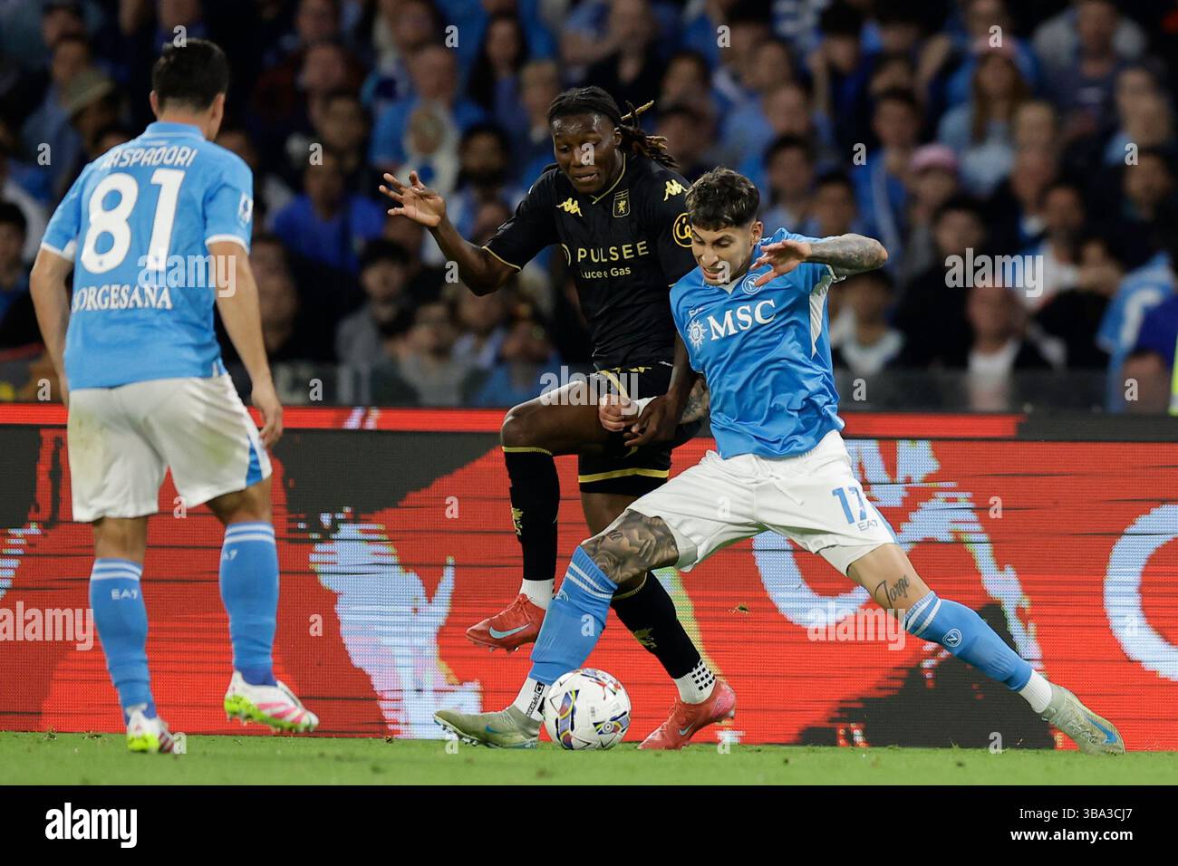 Genoa's Brooke Norton-Cuffy challenges Napoli's Mathías Olivera for the ...