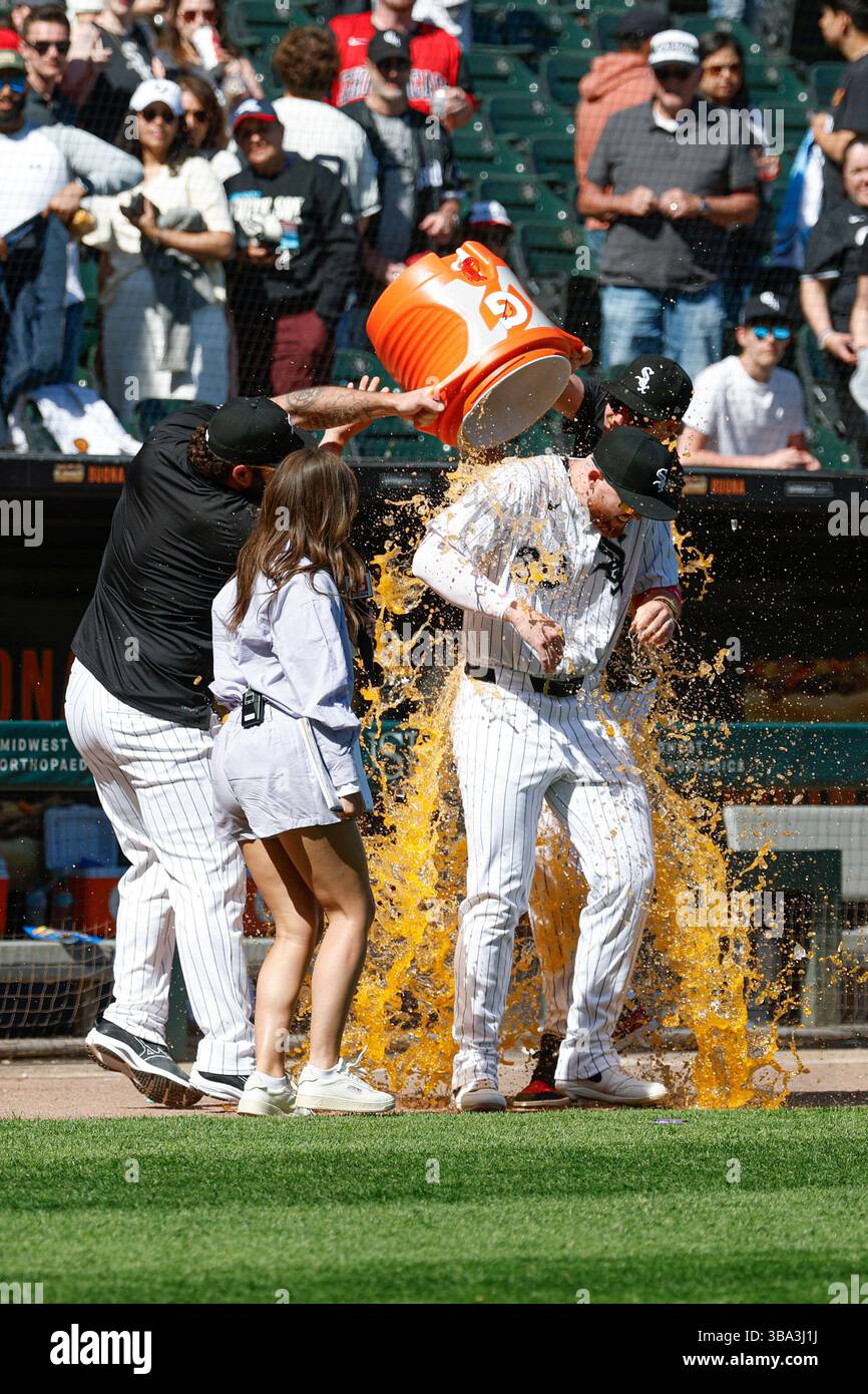 Chicago White Sox's Tim Elko, front right, is doused by teammates after ...