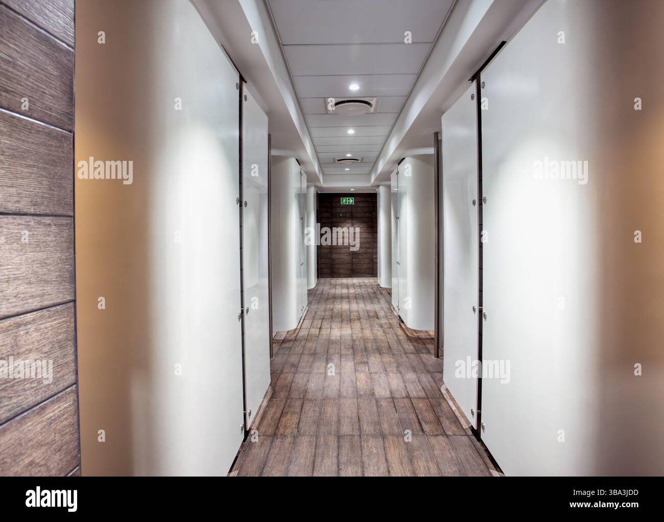 long hallway perspective, at the gym shower cabins in a row Stock Photo ...