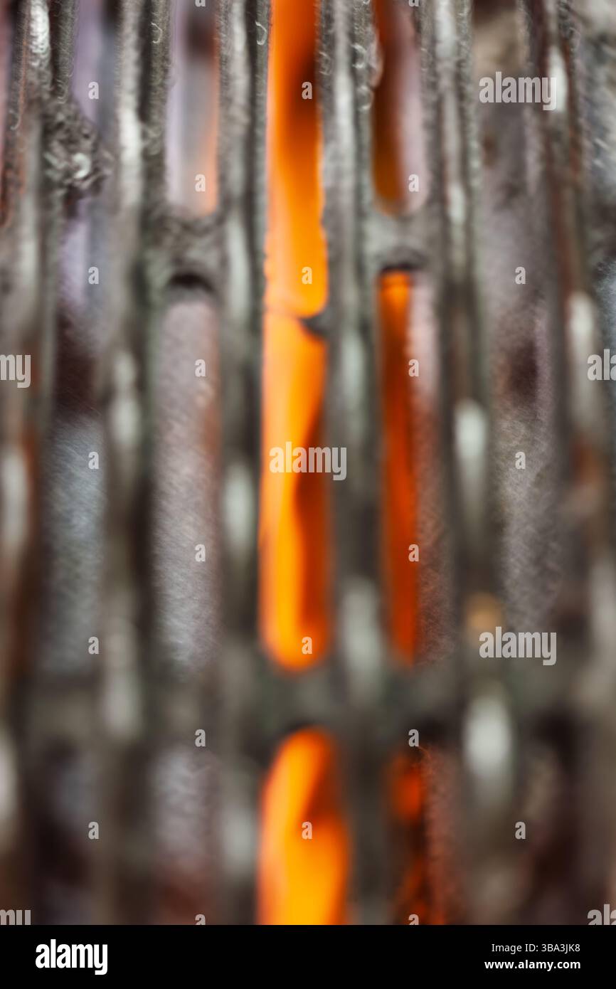 texture of metal and fire, grill and flames, motion blur ,out of focus ...