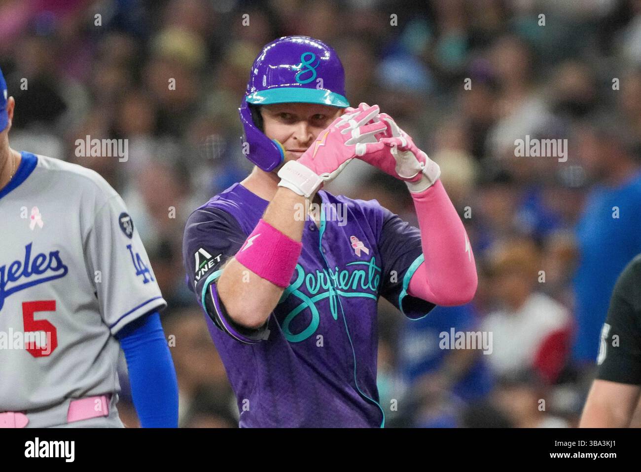 Arizona Diamondbacks' Pavin Smith gestures toward his dugout after ...
