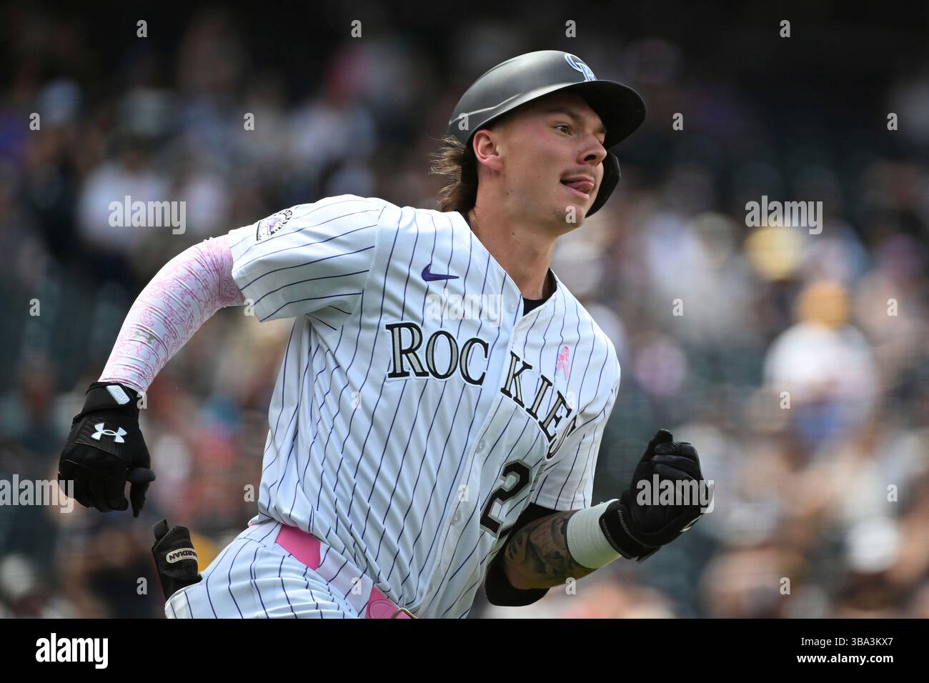 Colorado Rockies' Jordan Beck runs to second base on a double in the ...