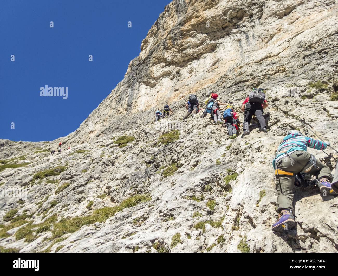 Climbing on the Pisciadu via ferrata of the Sella group in the ...