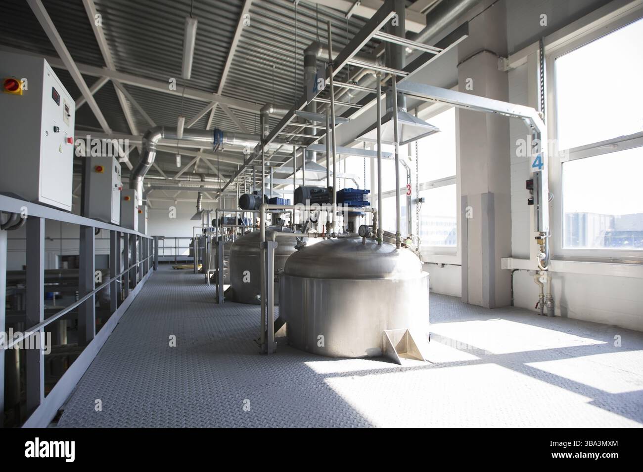 Chemical production. Metal tanks for the production of acid Stock Photo ...