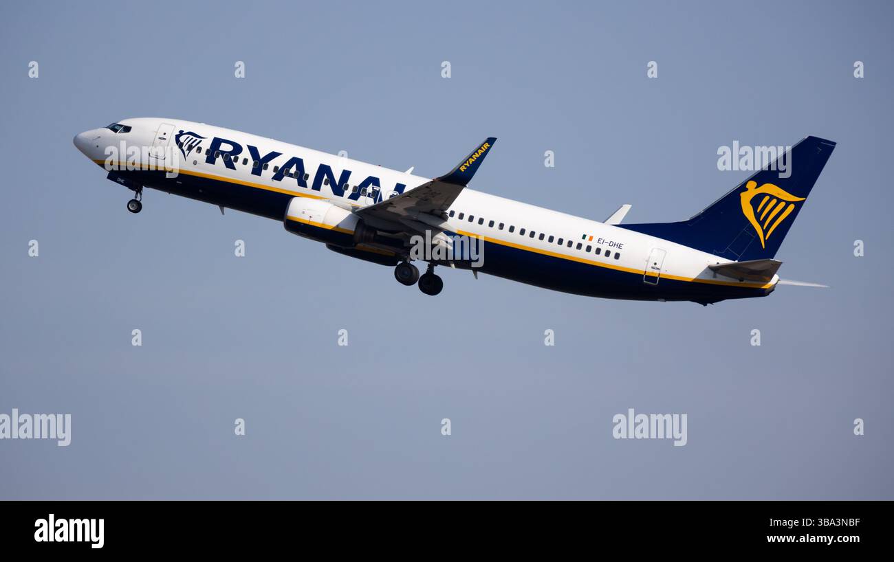 Ryanair aircraft in traditional livery ascending to sky from Barcelona ...