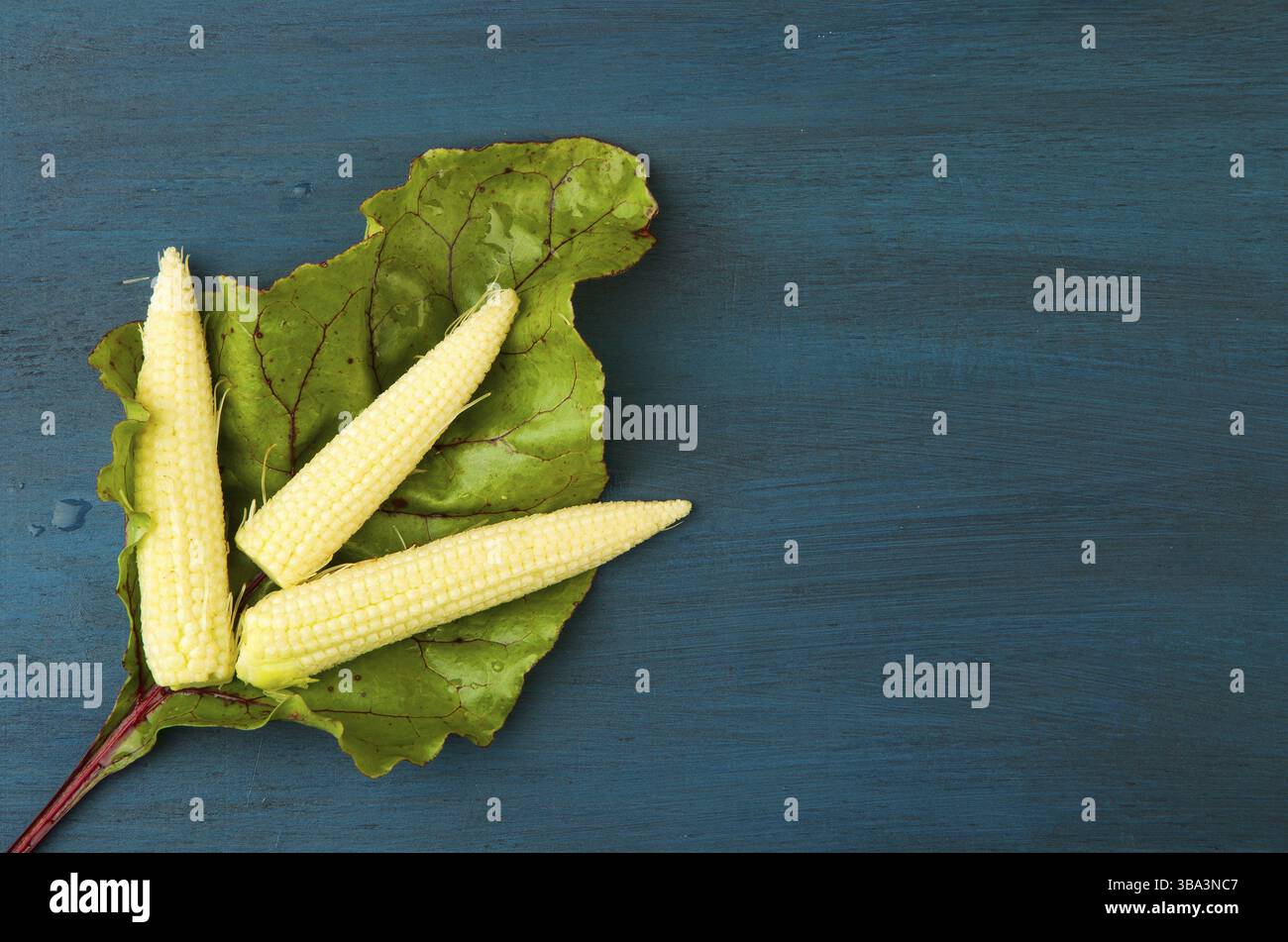BEET LEAF FRESH RAW CORN UNDER THE BRIGHT WOODEN SURFACE Stock Photo ...