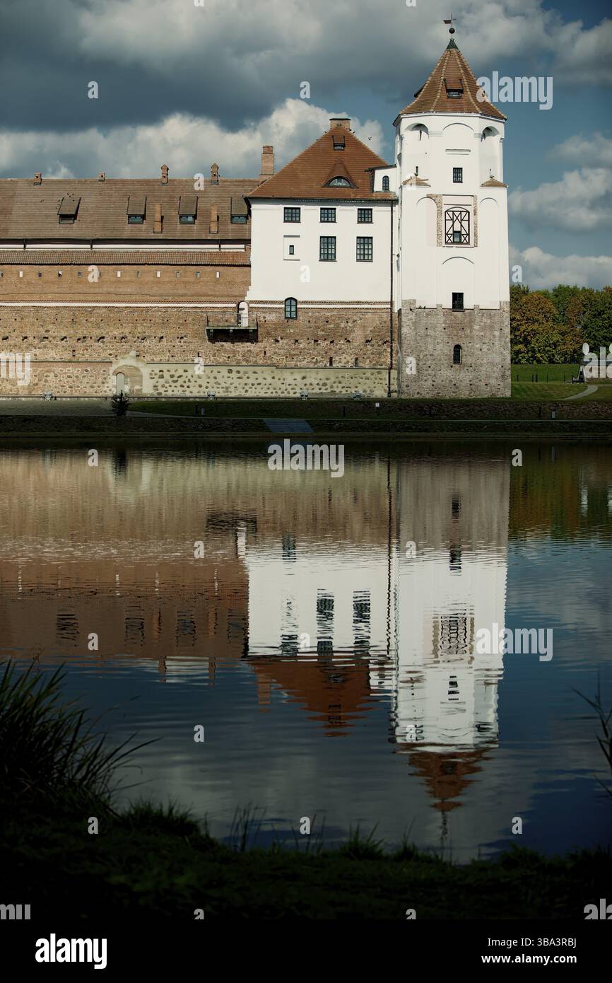 Ancient castle with water reflection under a beautiful sky Stock Photo ...