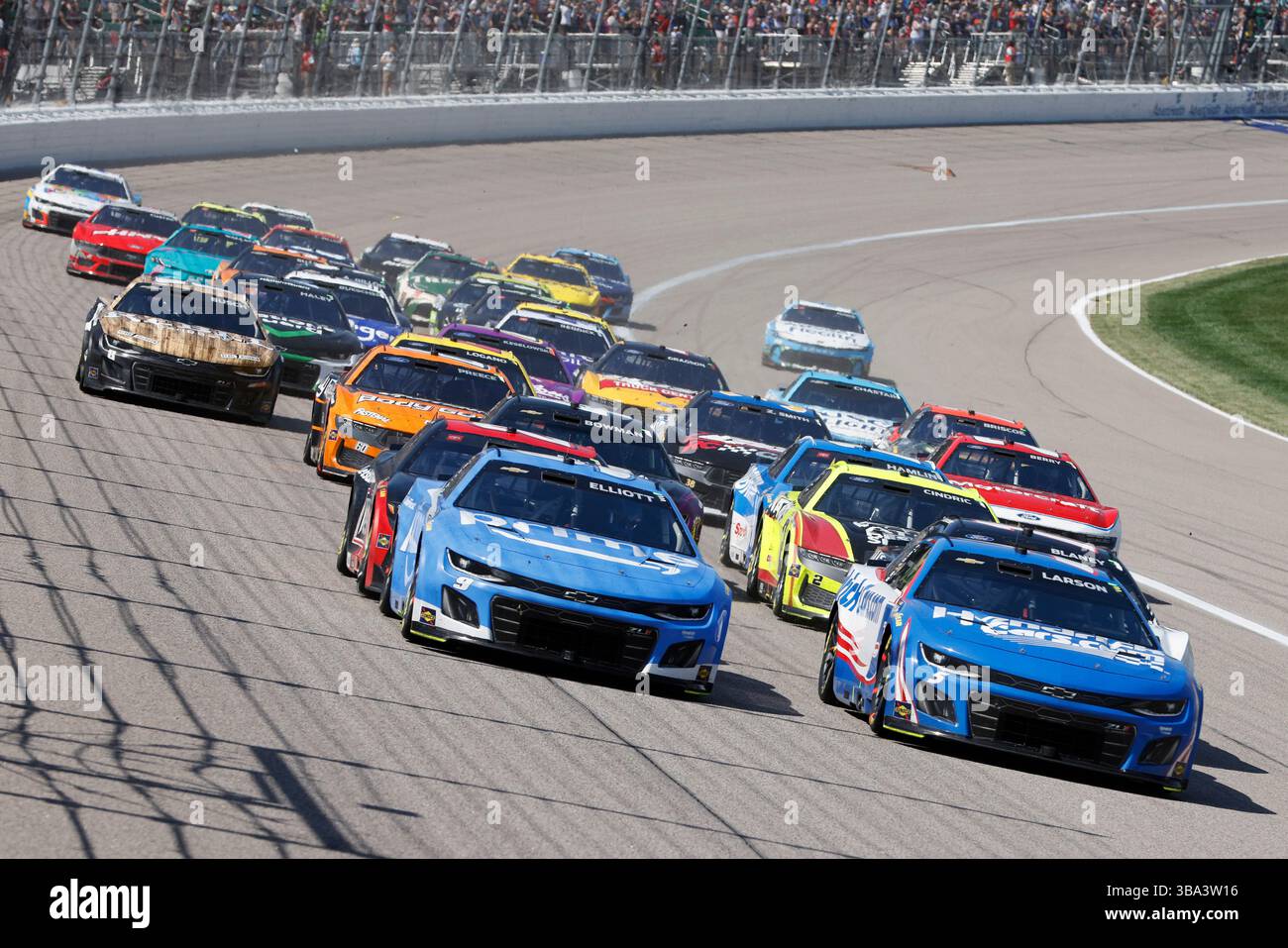 Drivers head through Turn 1 during a NASCAR Cup Series auto race at ...