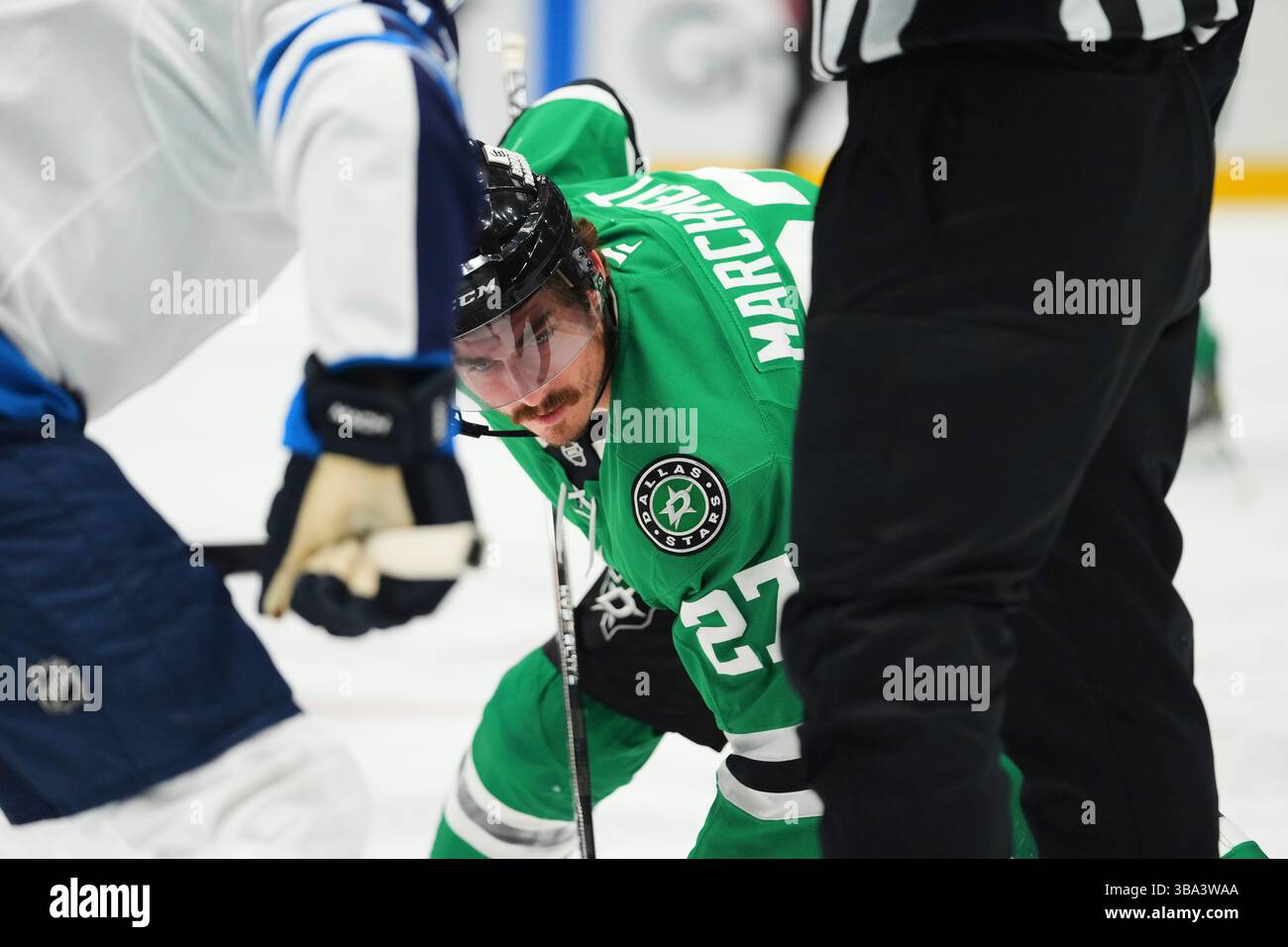 Dallas Stars' Mason Marchment (27) competes in a face-off against the ...