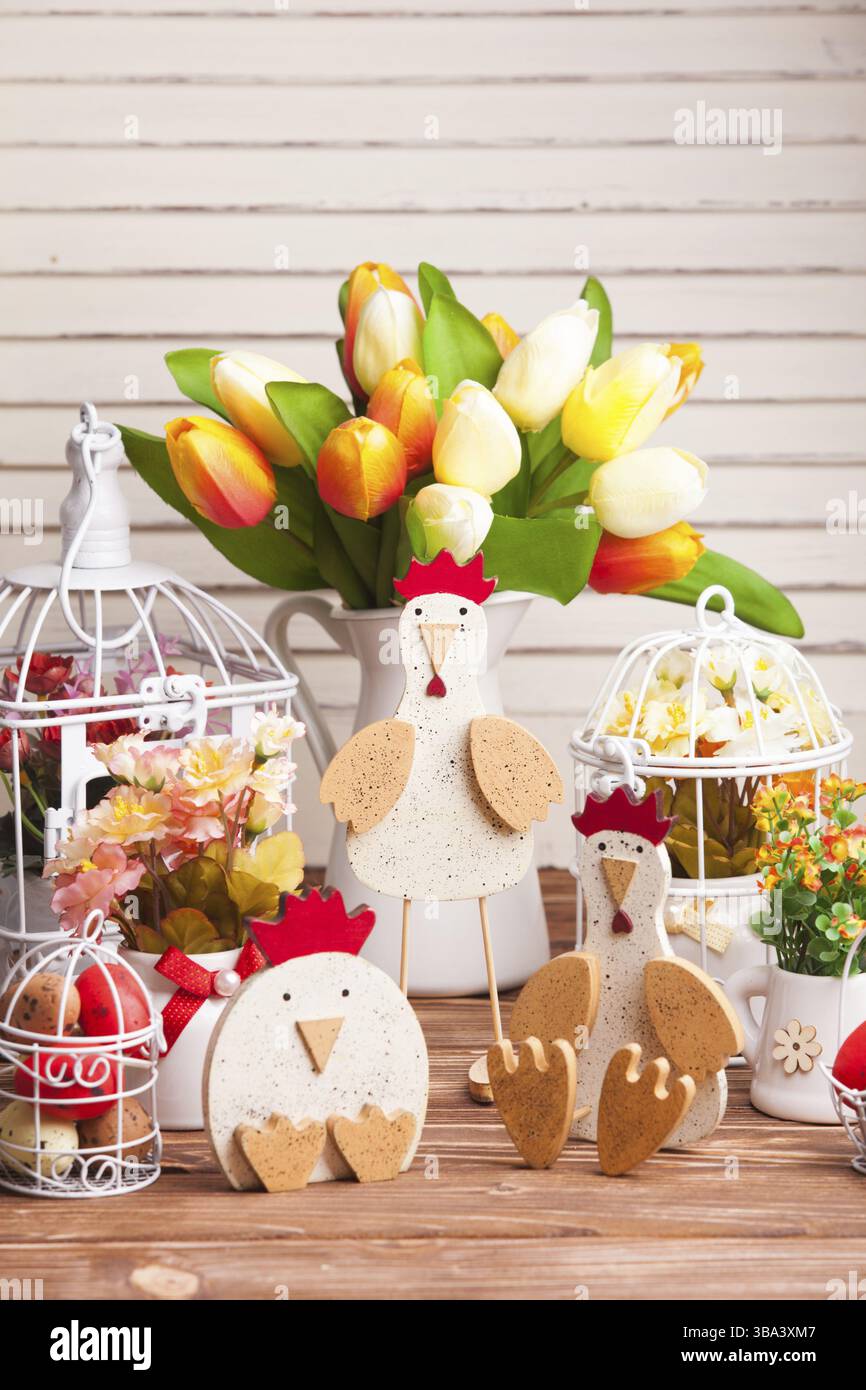 Wooden chickens figures - Easter decorations on the table Stock Photo ...