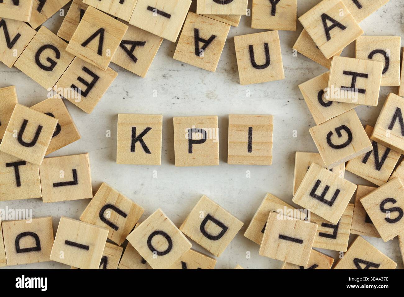 Top down view, pile of square wooden blocks with letters KPI (stands ...