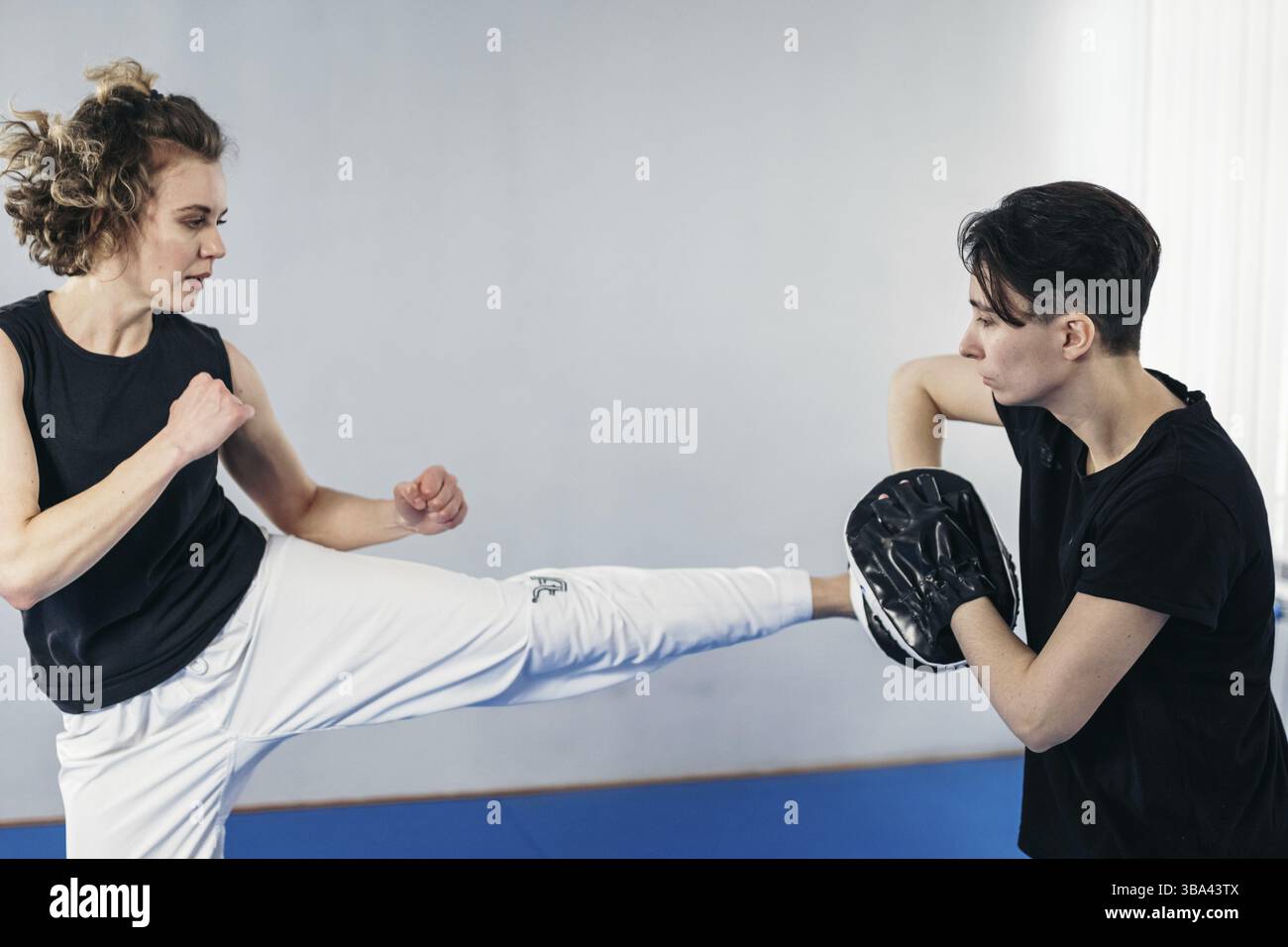 Taekwondo professional athlete woman kicks hi-res stock photography and ...