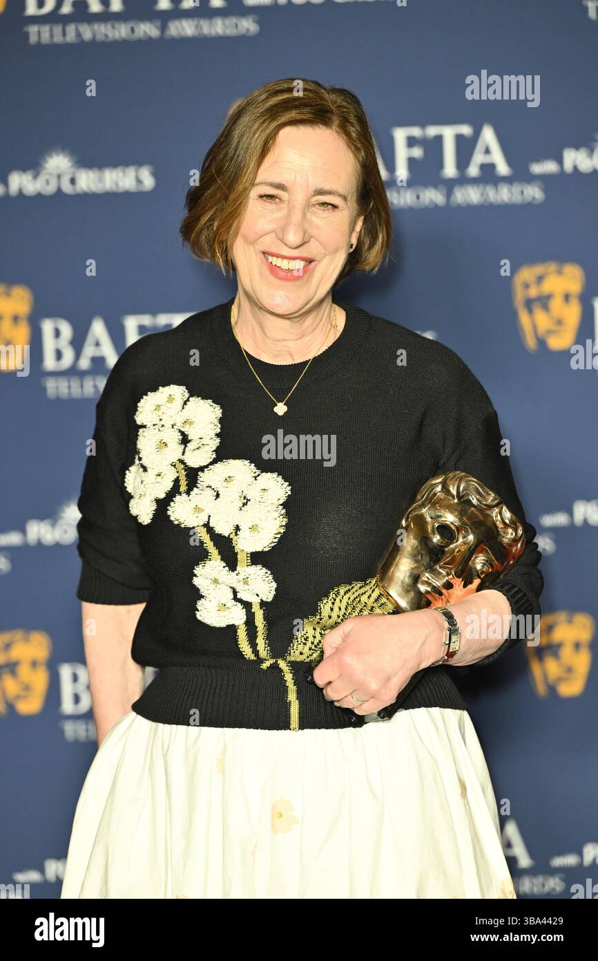 London, UK. 11th May, 2025. Kirsty Wark poses with the Fellowship Award ...