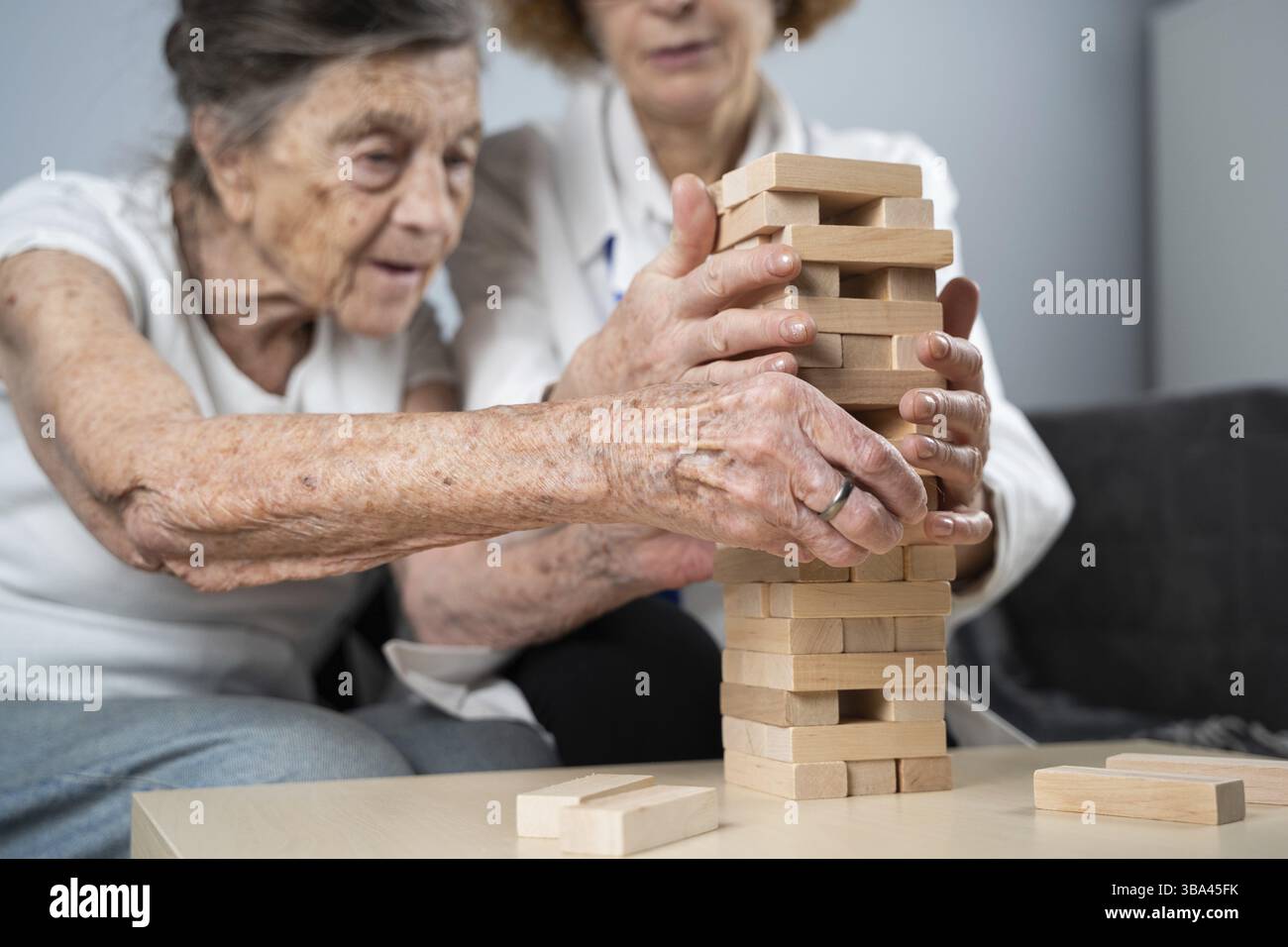 Jenga game. Theme is dementia, aging and games for old people ...