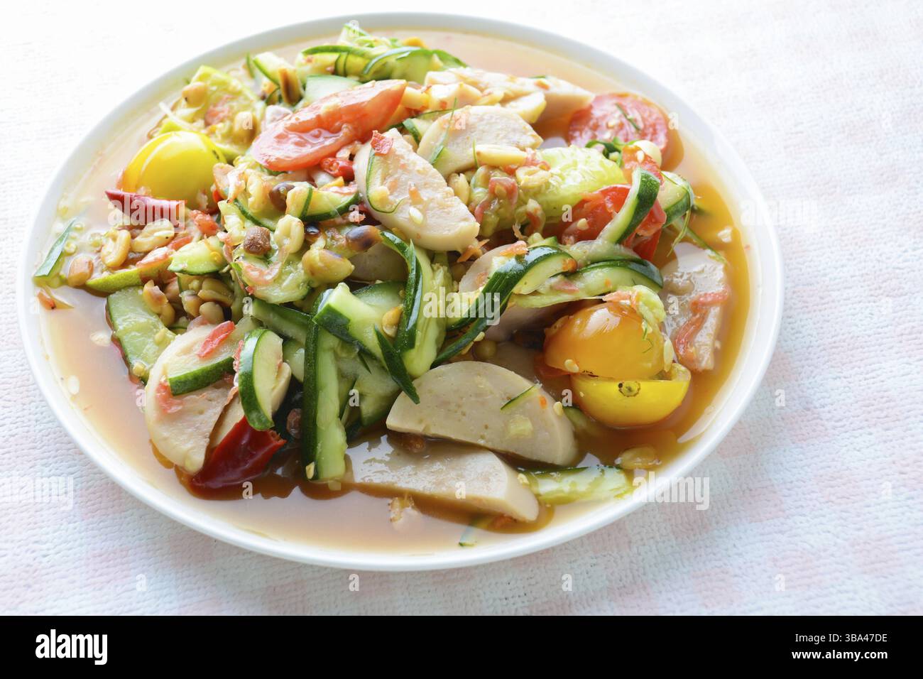 Cucumber salad with preserved pork sausages, Thai popular food called ...