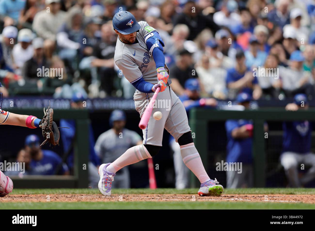 Toronto Blue Jays' George Springer hits a double against the Seattle Mariners during the seventh ...