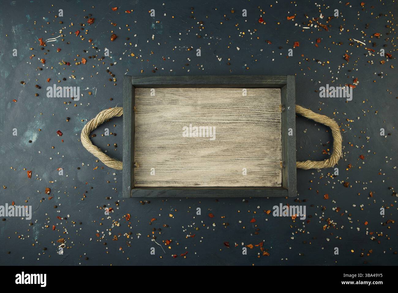 WOODEN BOX WITH ROPE HANDLES ON TEXTURED STONE BACKGROUND. WOODEN ...