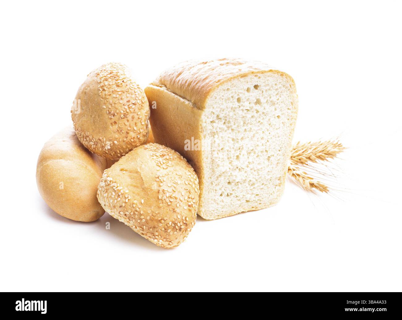 Different types of wheat bread and buns isolated on white Stock Photo ...