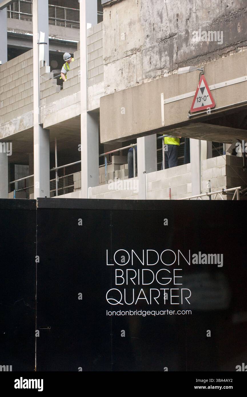 Construction workers building a new structure in London Bridge Quarter ...