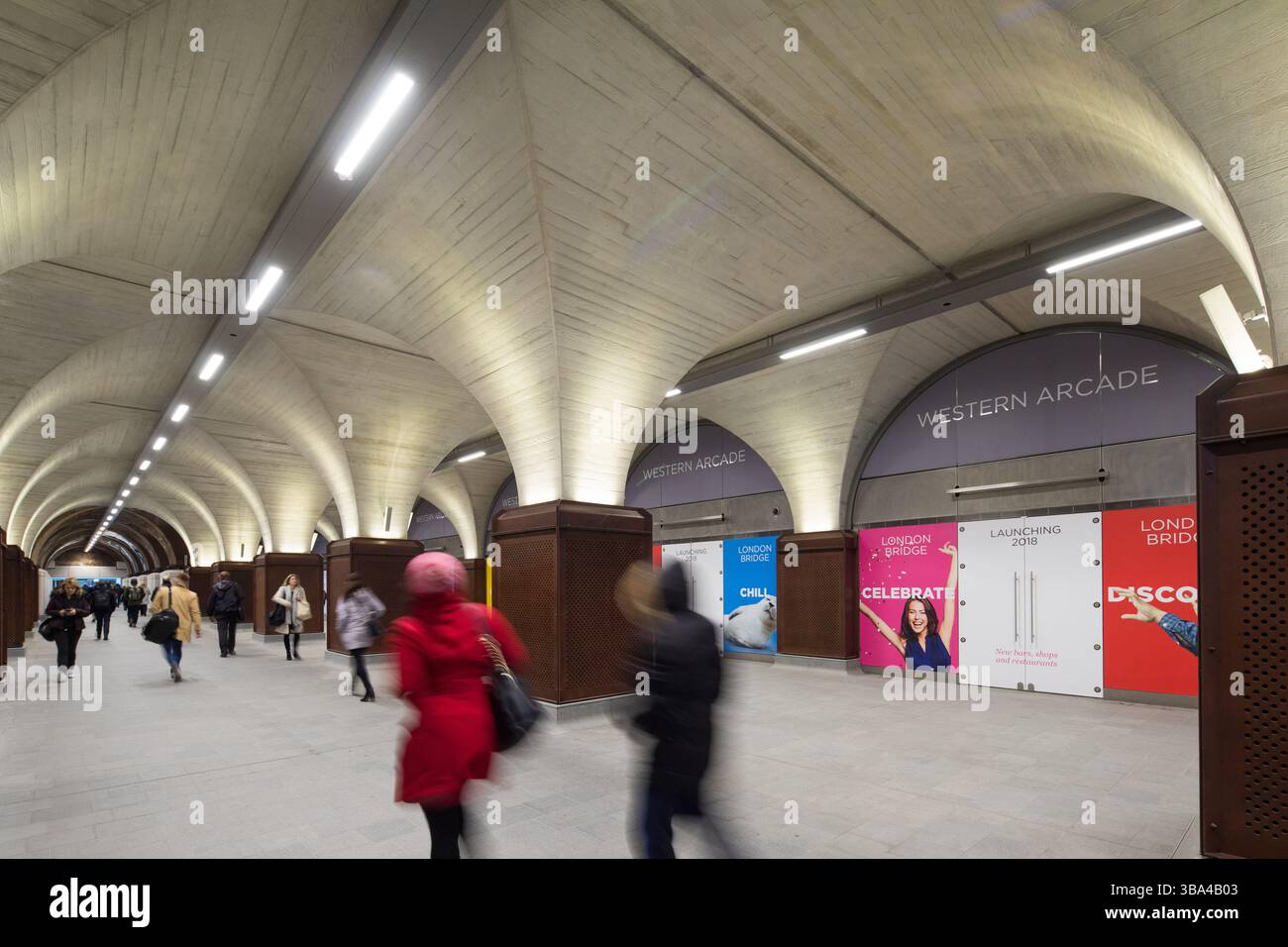 Commuters walk through the Western Arcade at London Bridge Station. The ...