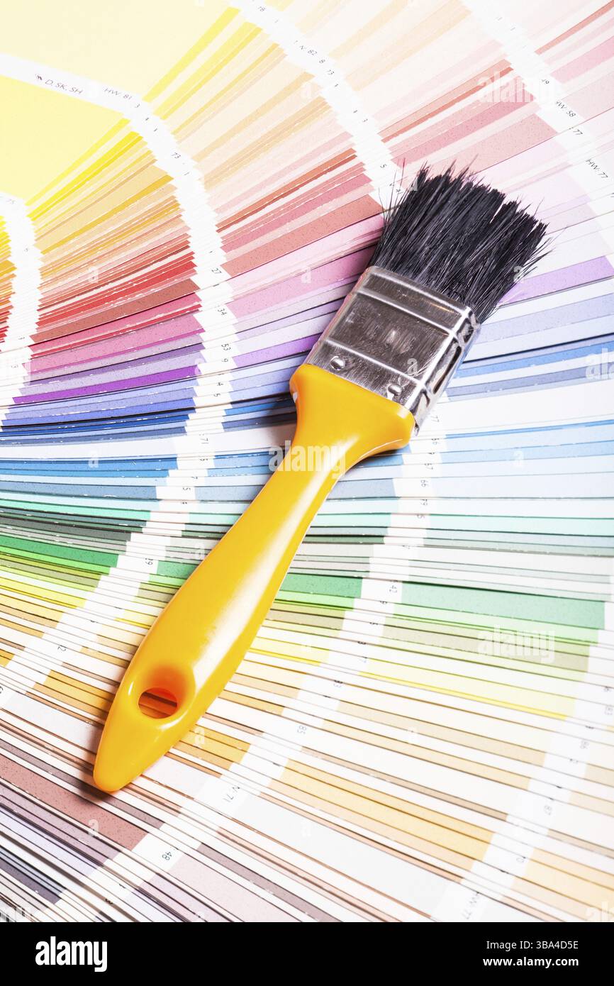 Paper samples palette with brush for choosing wall color for painting ...