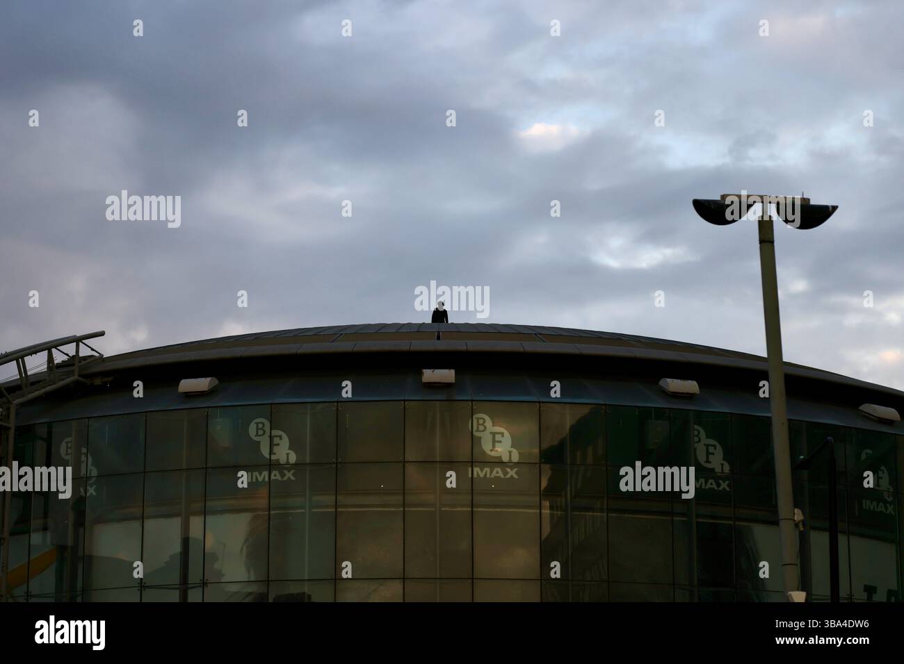 London, UK. 11th May, 2025. Tom Cruise standing on the roof of the BFI ...