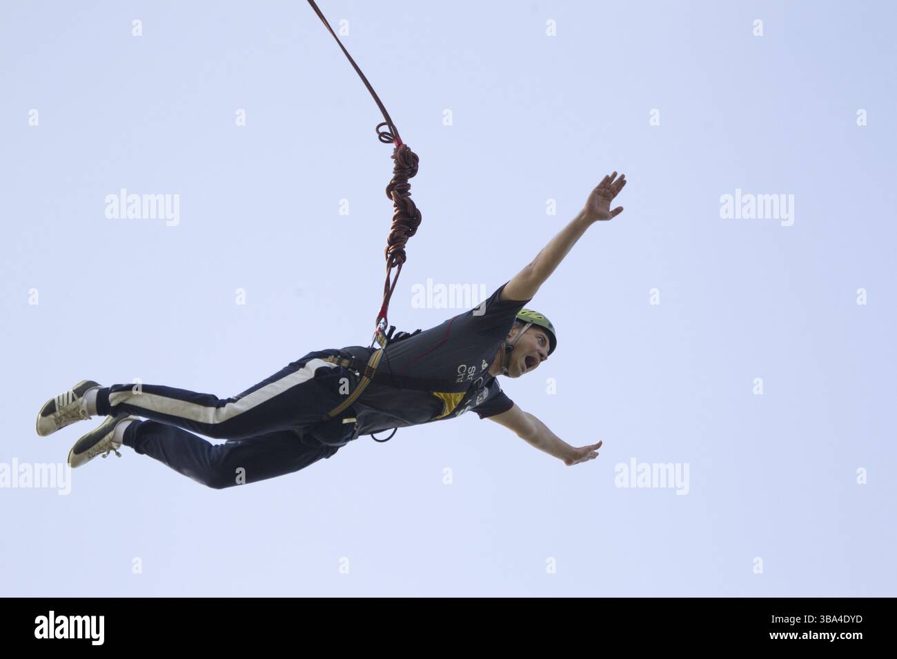 Jumping with a rope.Man on the rope.Ropejumping Stock Photo - Alamy