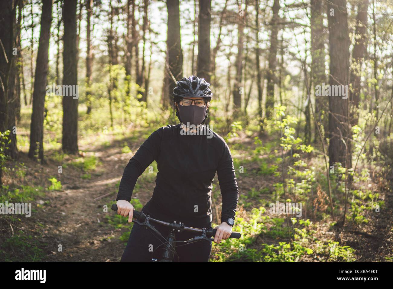Female cyclist wears face hi-res stock photography and images - Alamy