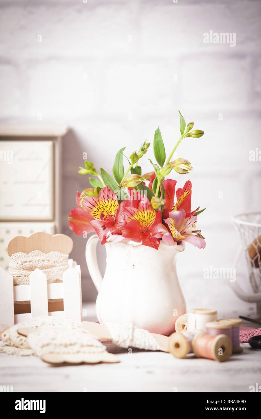 Vintage still life with handcraft materials and flowers Stock Photo - Alamy