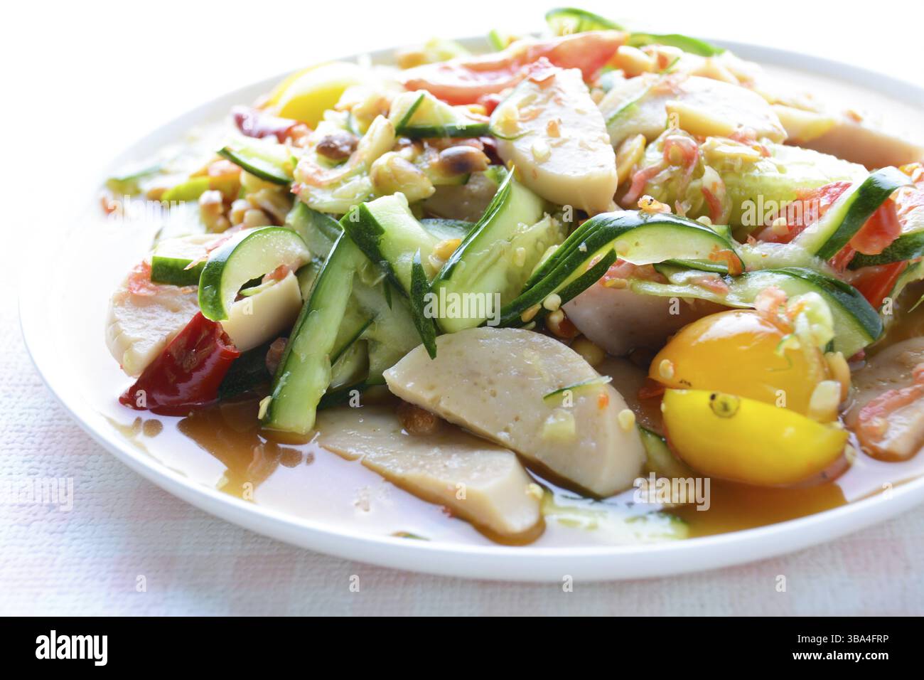 Cucumber salad with preserved pork sausages, Thai popular food called ...
