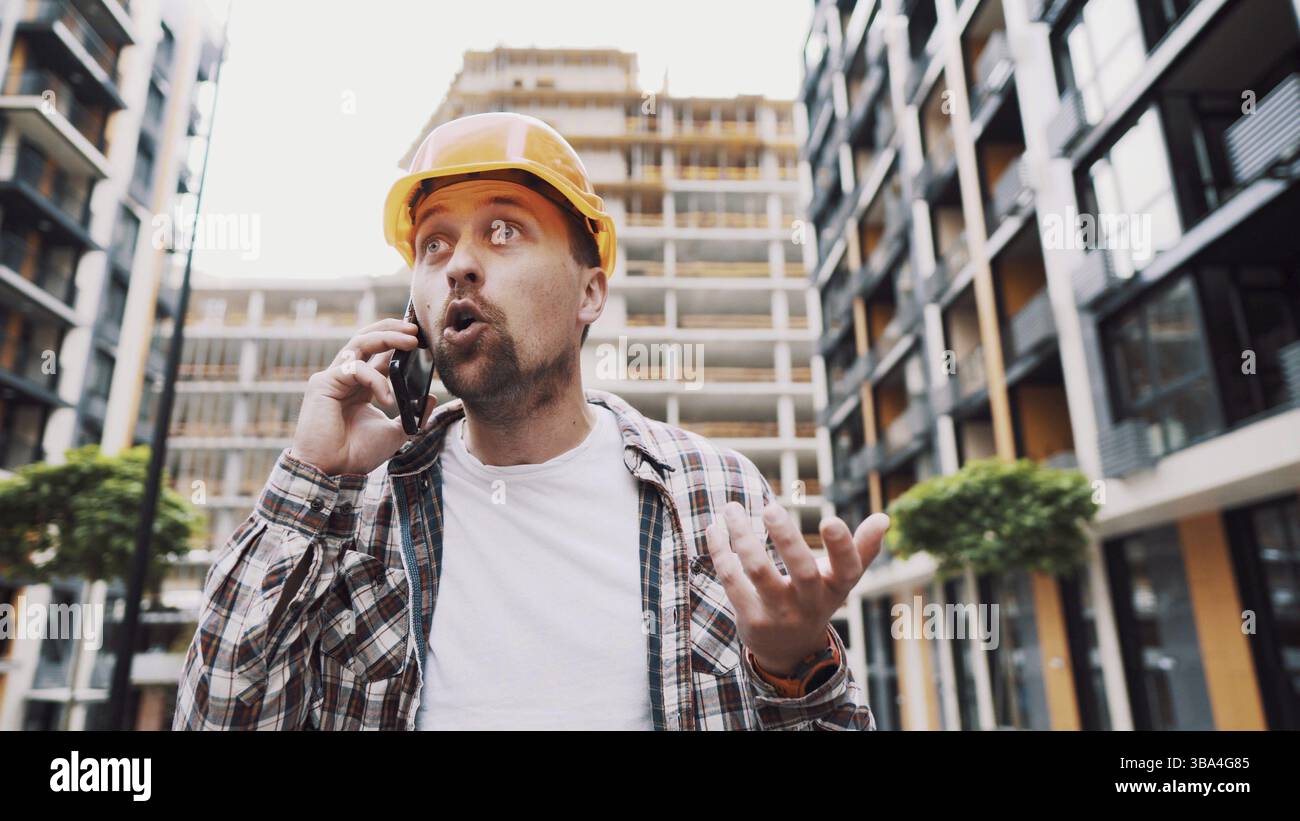 Angry builder, dissatisfied with deadline of work, swears at stress ...