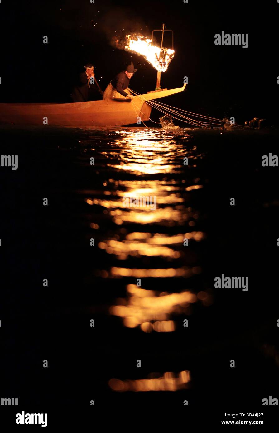 The cormorant fishing on Nagara River begins with bonfires lighting up ...