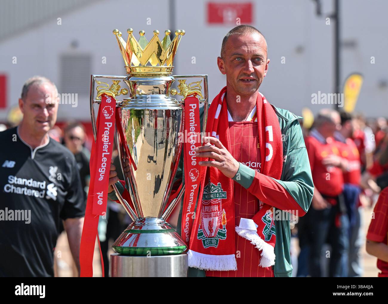 Liverpool, UK. 11th May, 2025. A Liverpool fan poses for a photo ...