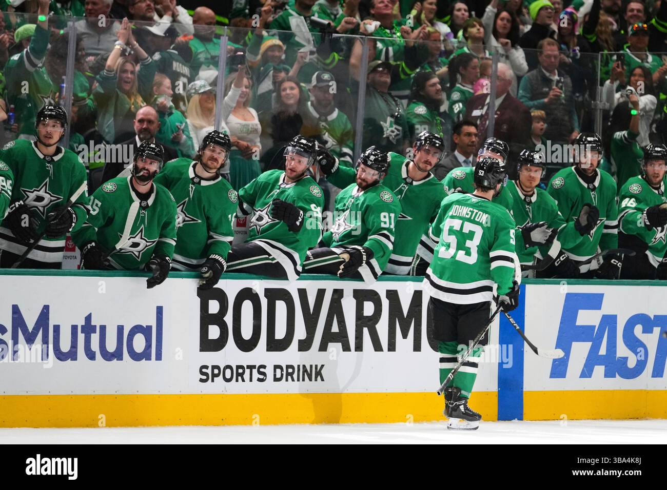 The Dallas Stars bench celebrates with Wyatt Johnston (53) after his ...