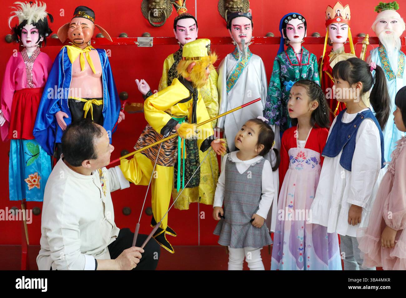 QINGDAO, CHINA - MAY 11, 2025 - A puppet actor is demonstrating the ...
