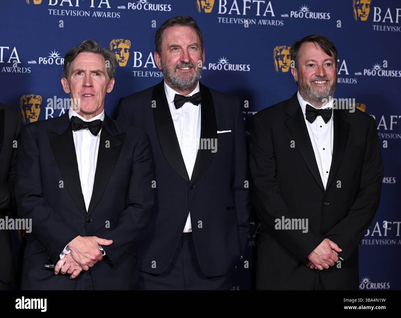 London, UK. May 11th, 2025. Rob Brydon, Lee Mack and David Mitchell at the BAFTA Television ...