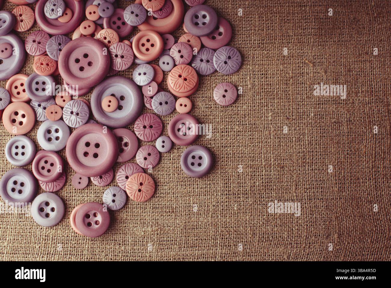 The collection with many buttons of different colors, shape and sizes ...