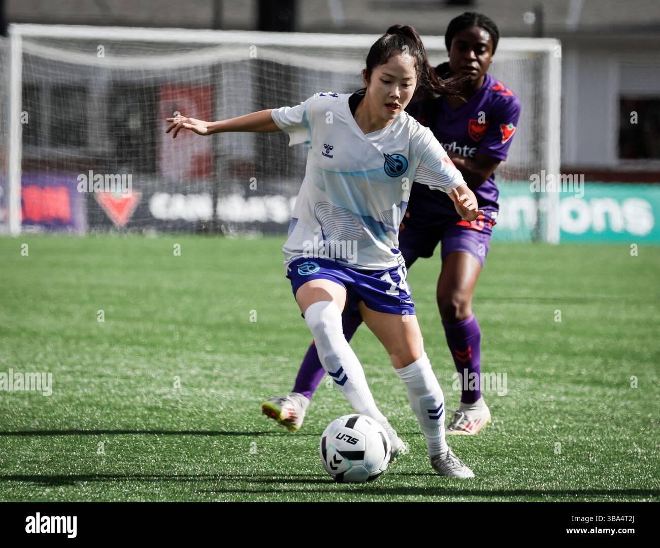 Ottawa Rapid's Lee Min-a, left, steals the ball from Calgary Wild's ...