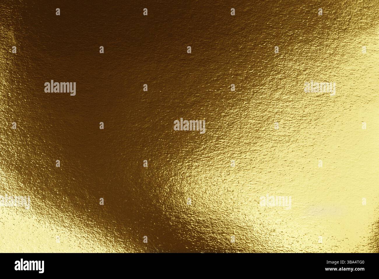 Texture of gold. Gold paper with dark and light shades Stock Photo - Alamy