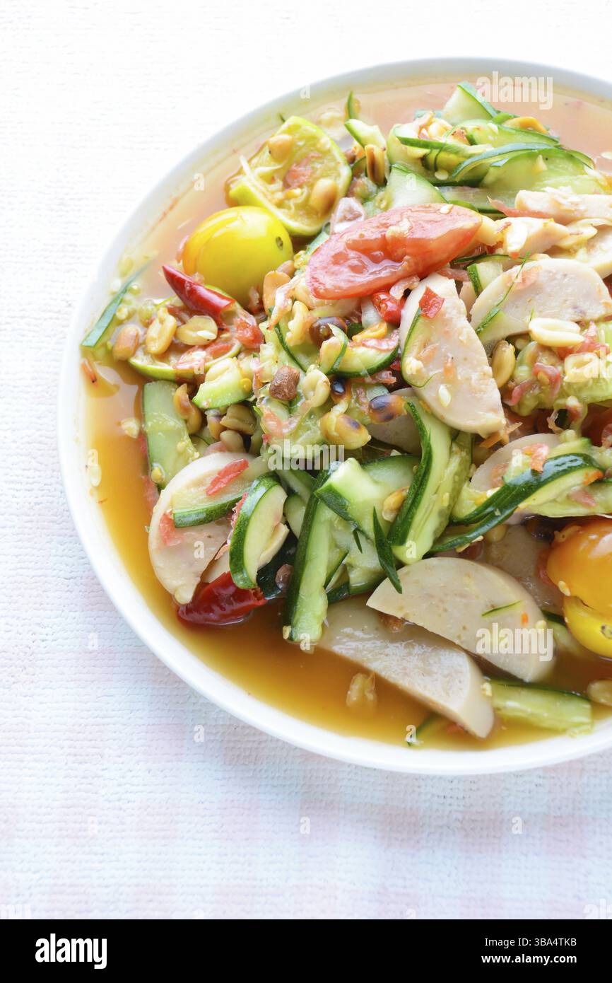 Cucumber salad with preserved pork sausages, Thai popular food called ...