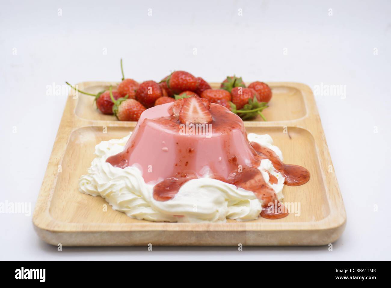 Italian dessert Pana Cotta with strawberries Stock Photo - Alamy