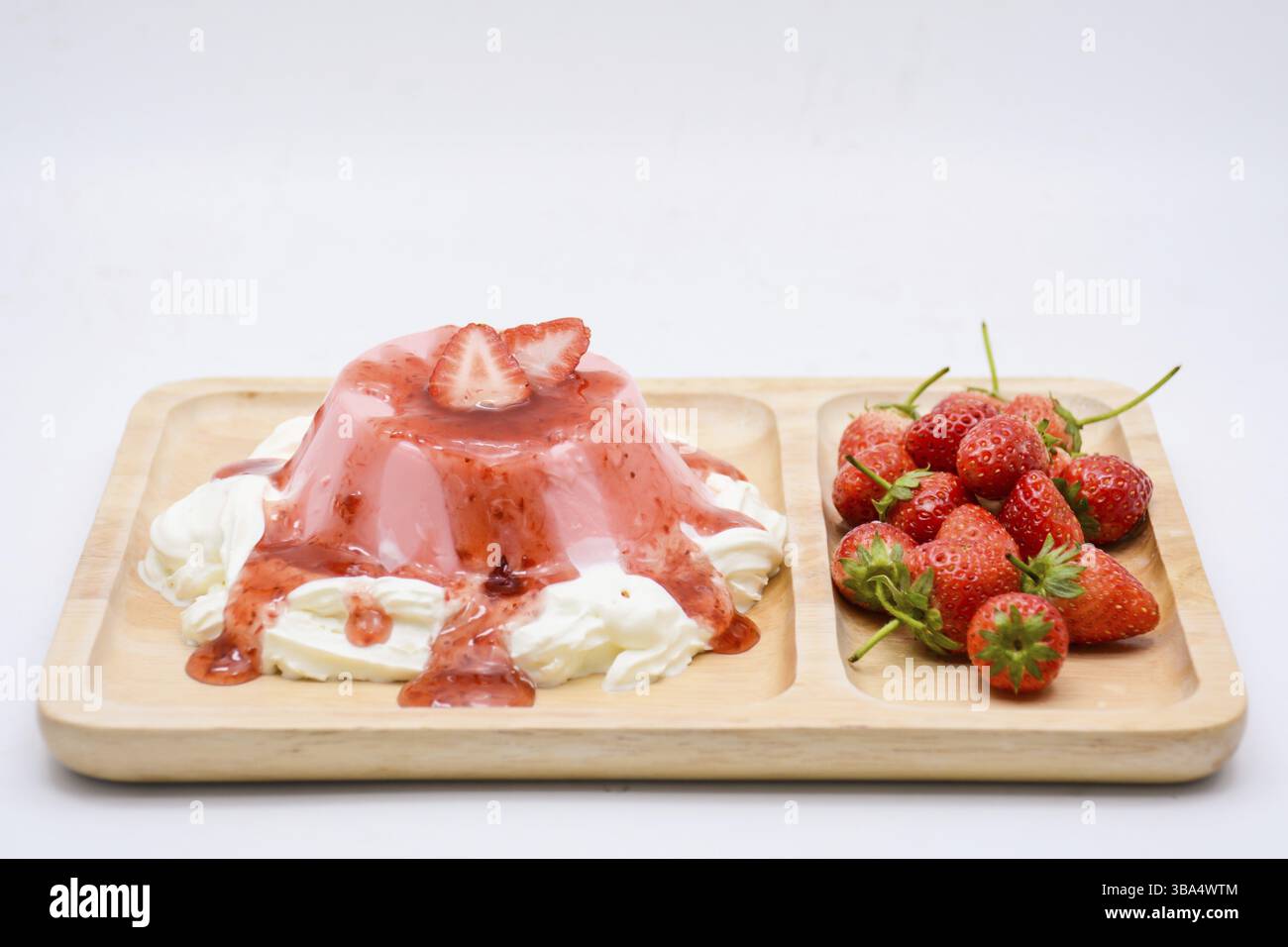 Italian dessert Pana Cotta with strawberries Stock Photo - Alamy