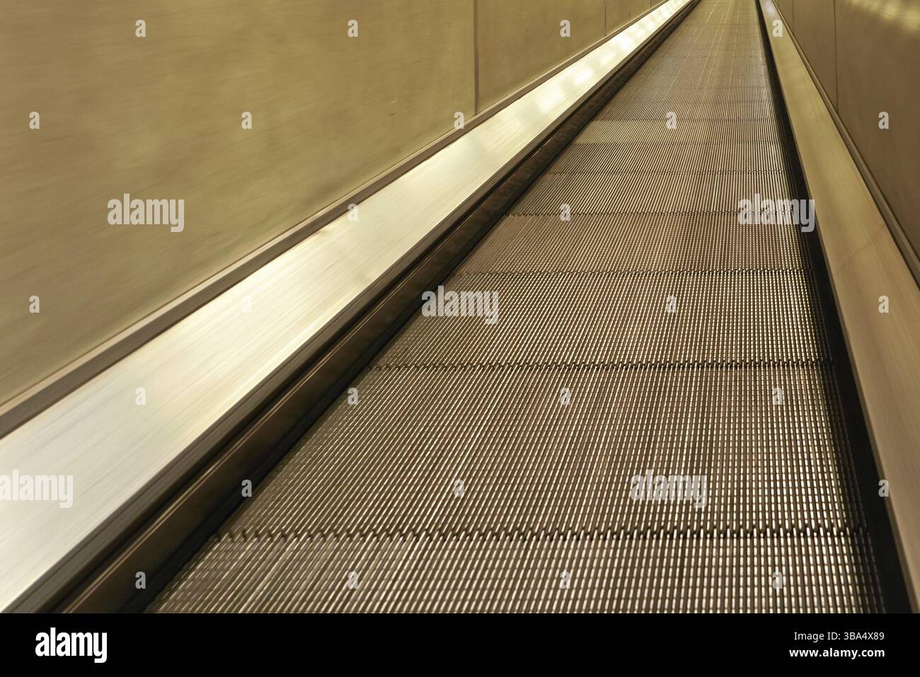 Flat escalator - moving walkway travelator in underground train station ...