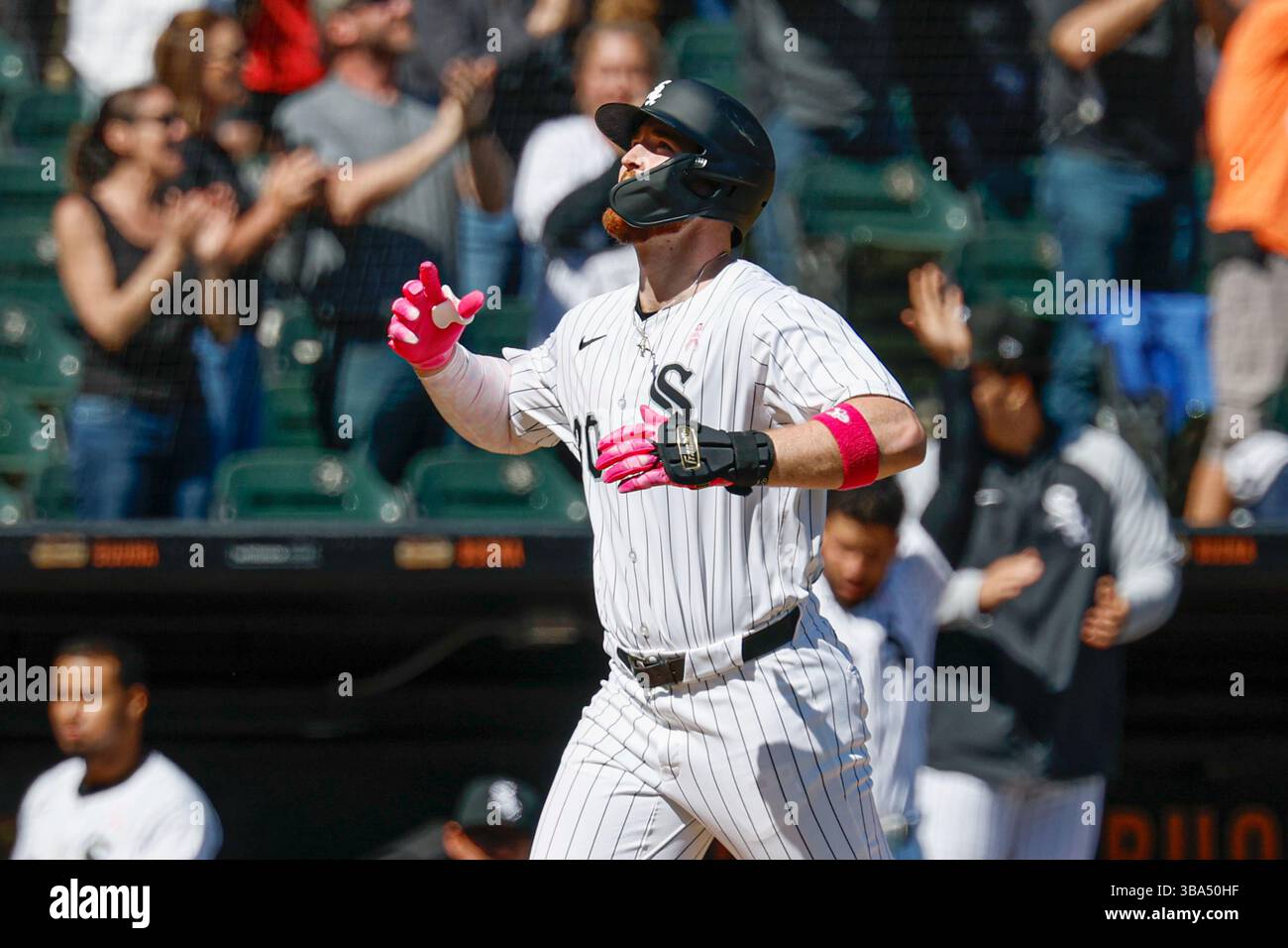 Chicago White Sox's Tim Elko rounds the bases after hitting a three-run ...